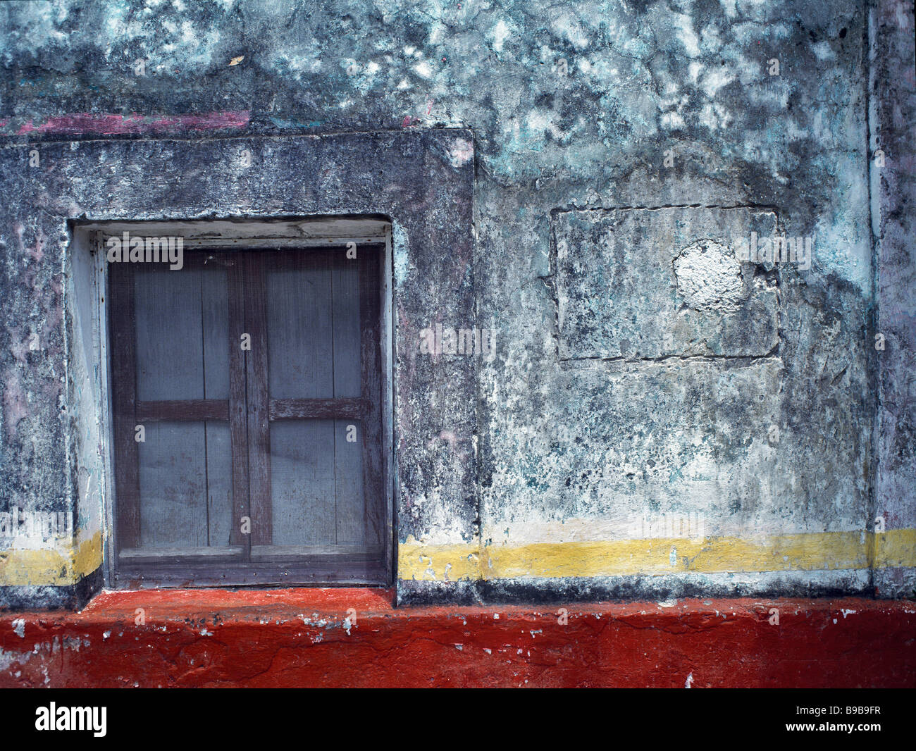 Colourful wall and window of a house in Corozal, Belize, Central ...