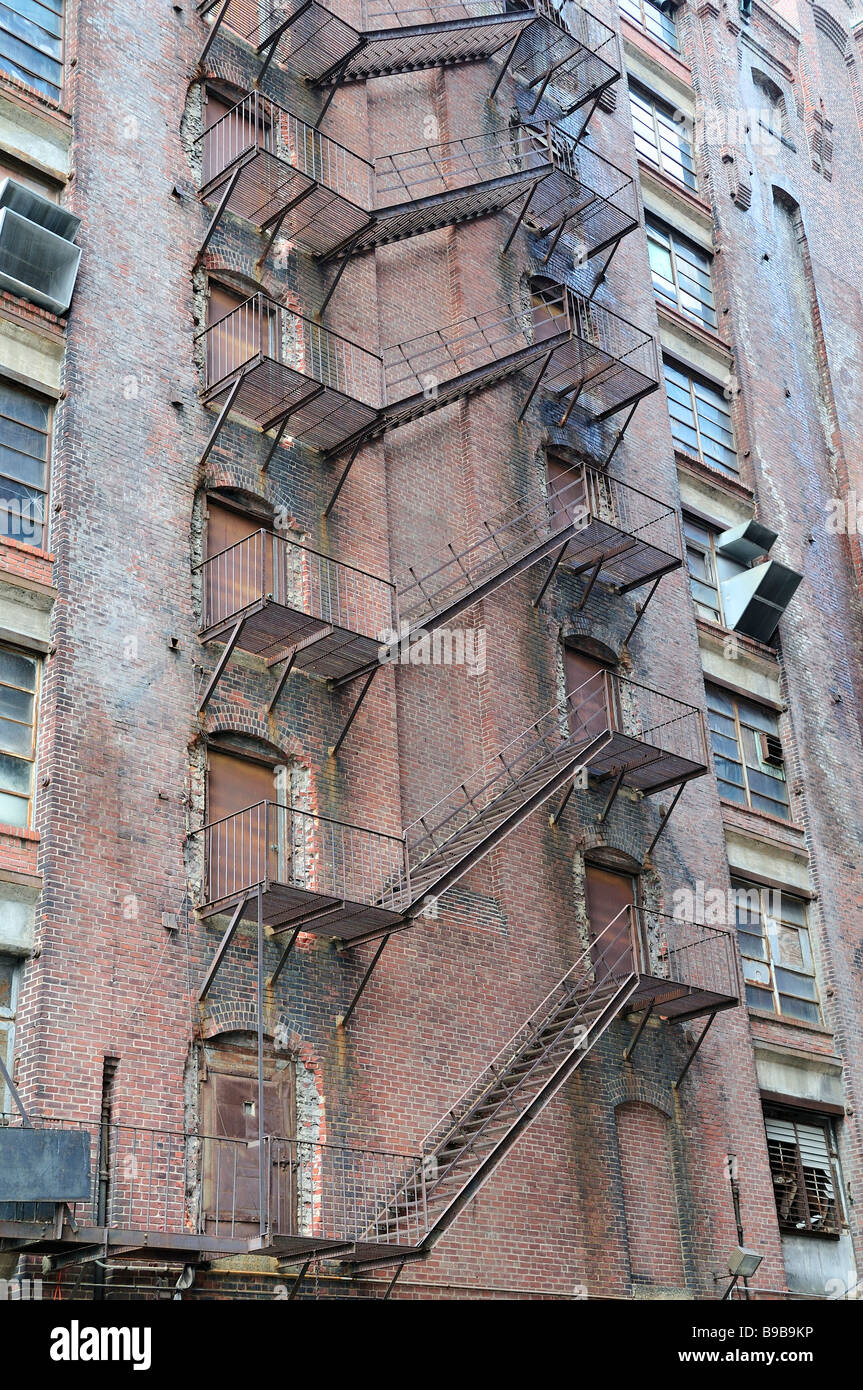 fire escape ladder of the old industrial building Stock Photo - Alamy