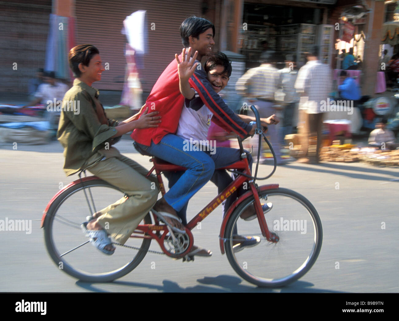 Indian boys riding a bike hi-res stock photography and images - Alamy