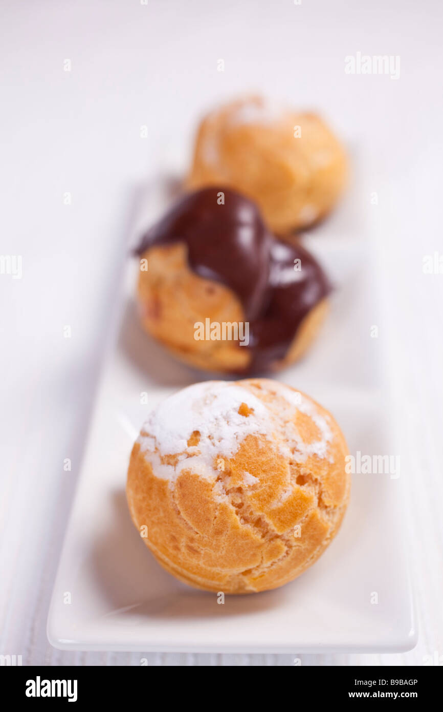 Puff pastry balls filled with vanilla chantilly and chocolate cream ...