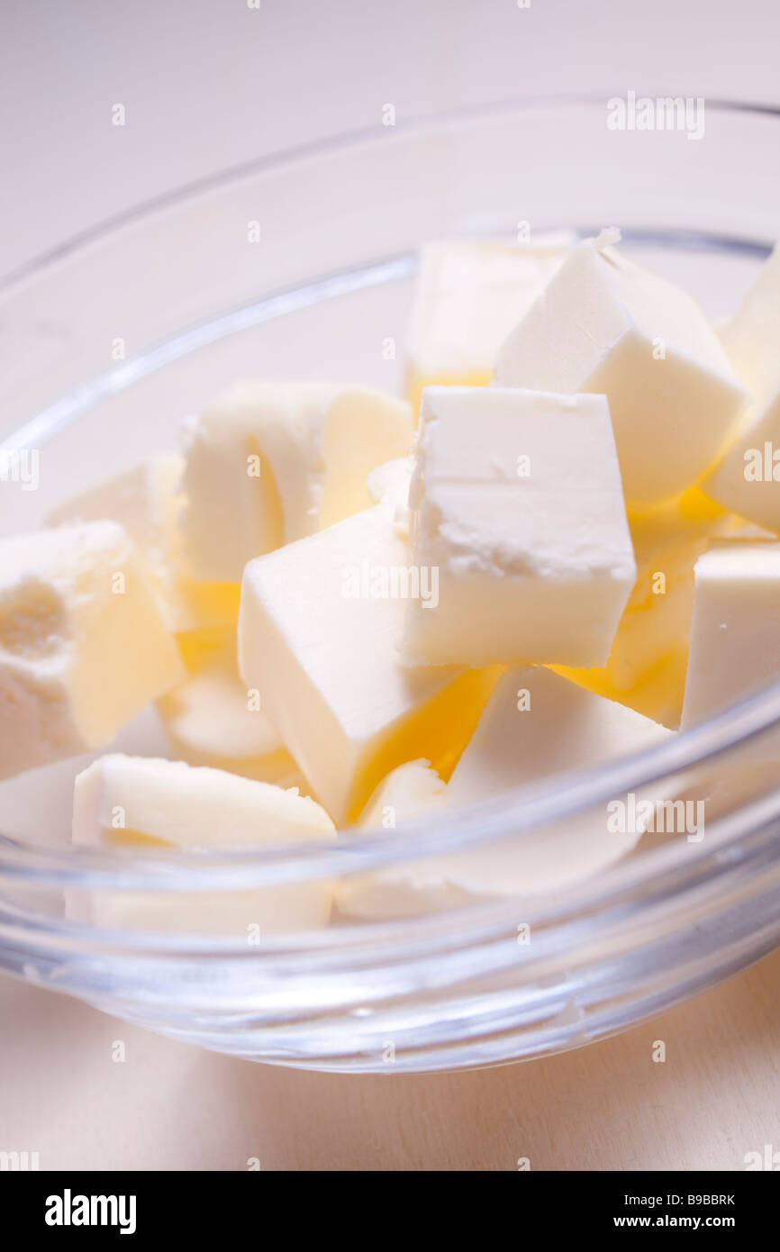 Butter cubes in a glass bowl Stock Photo - Alamy