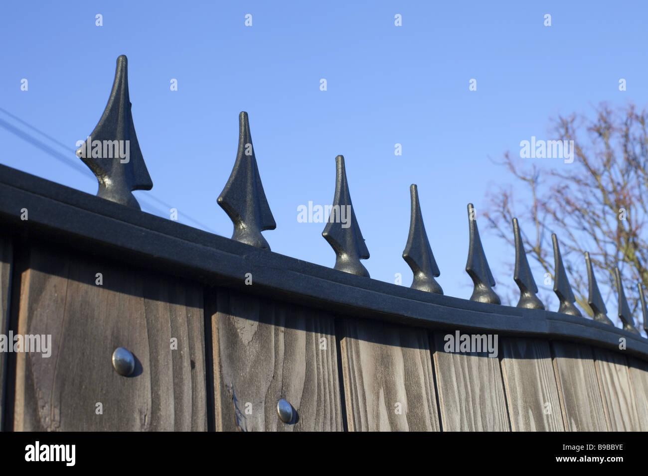 old wooden gate with spikes Stock Photo - Alamy