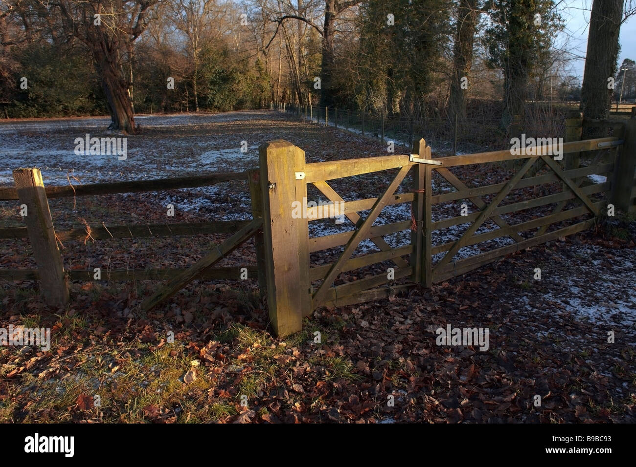 a gated entrance to field Stock Photo - Alamy
