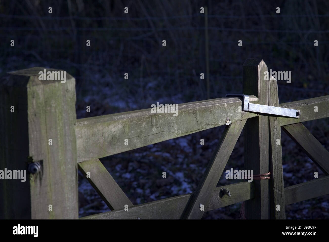 a gated entrance to field Stock Photo - Alamy