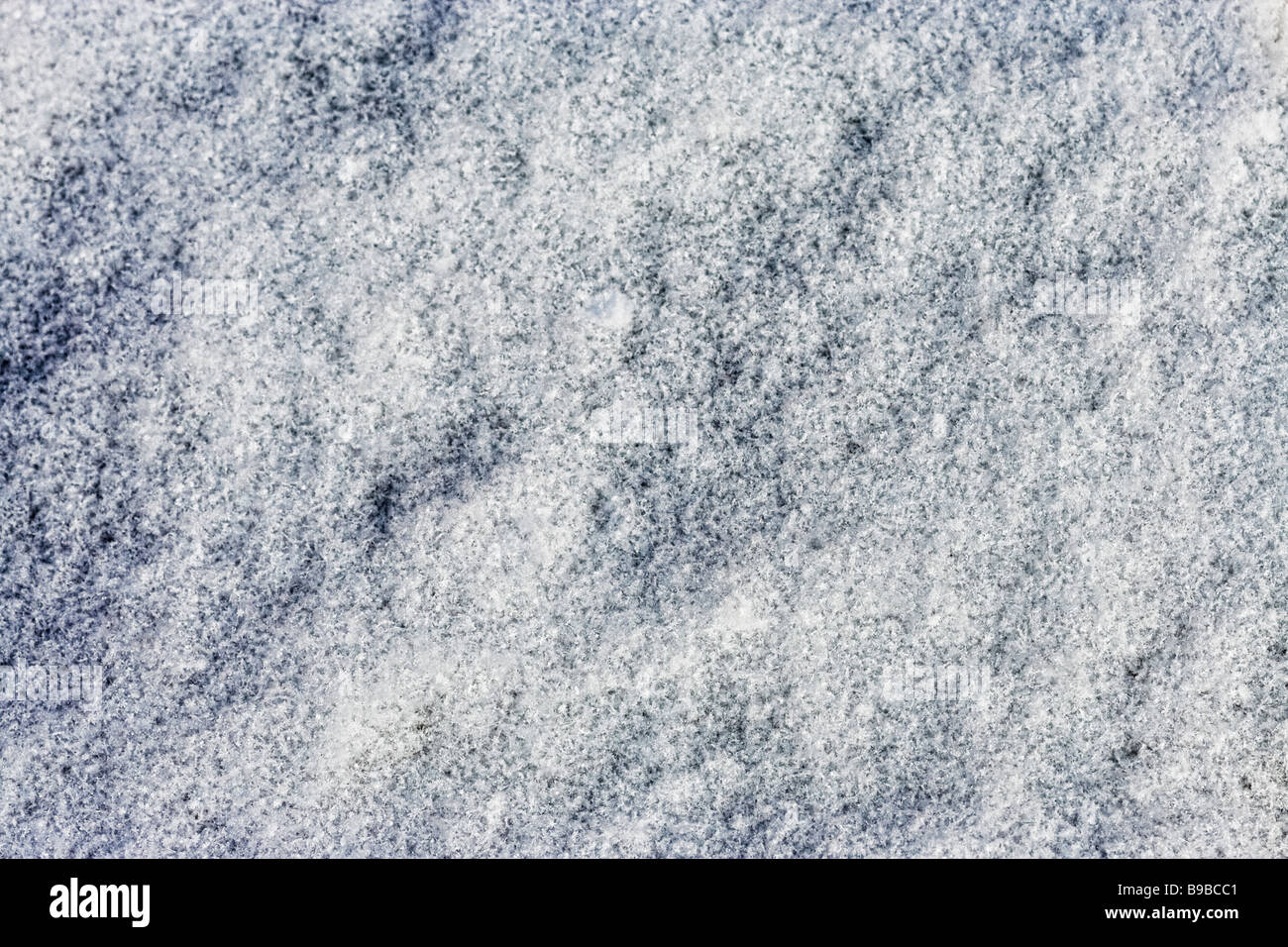 Snow pattern on ground Stock Photo - Alamy