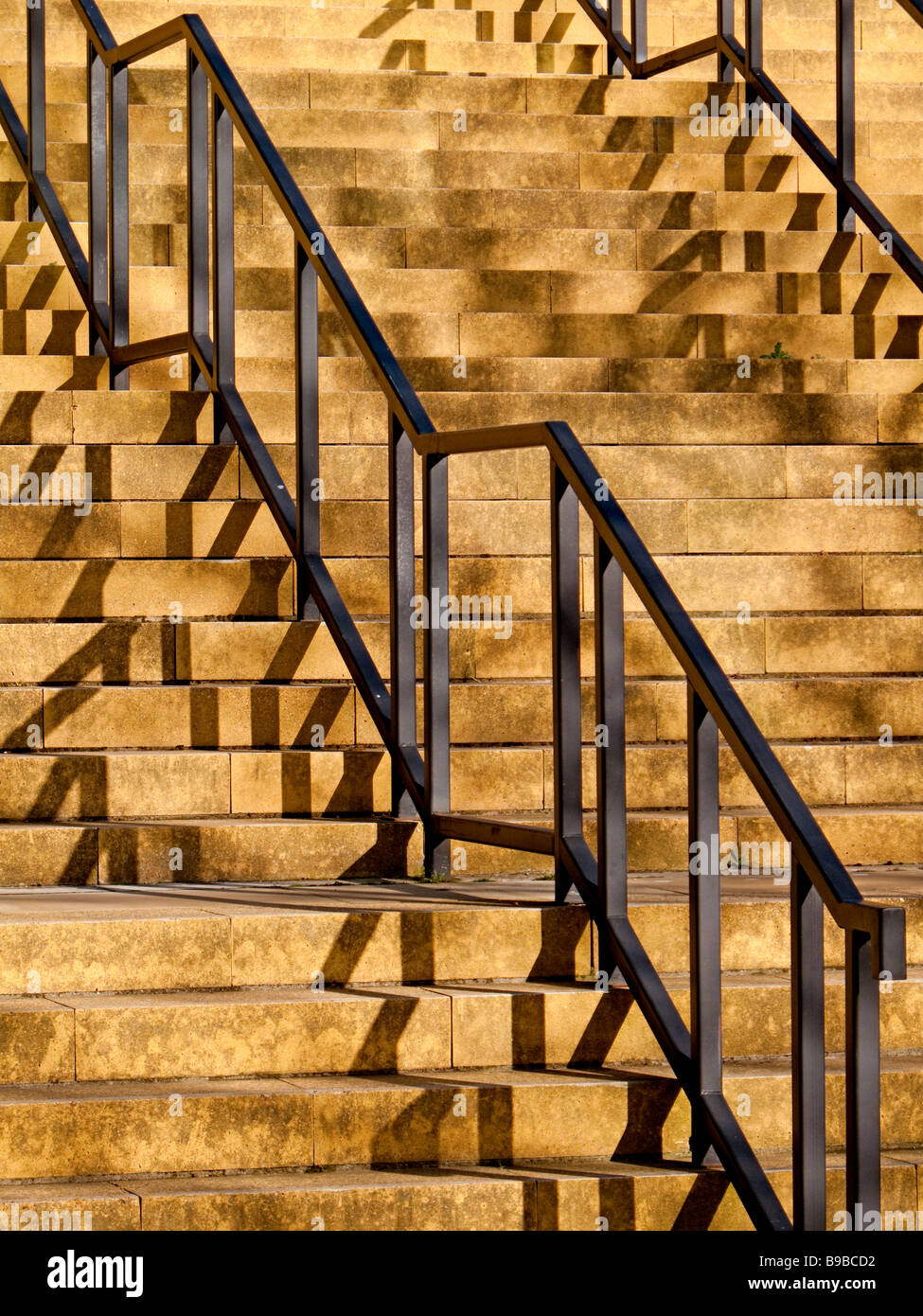 Shadows of hand rails against concrete steps in the sun Stock Photo - Alamy