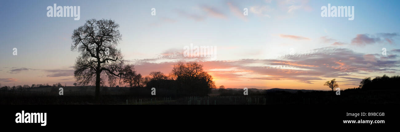 A winter sunset in the countryside Stock Photo - Alamy