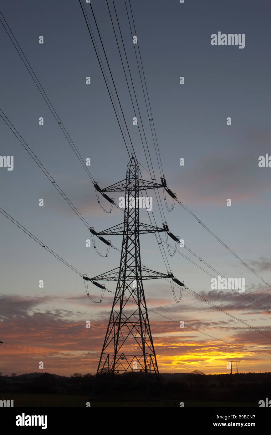 metal pylon carrying electricity supply power lines Stock Photo - Alamy