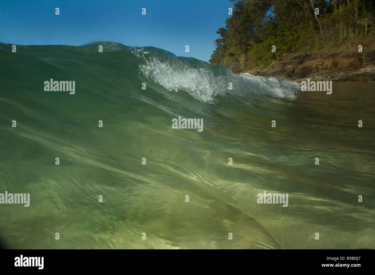 Small breaking wave hi-res stock photography and images - Alamy