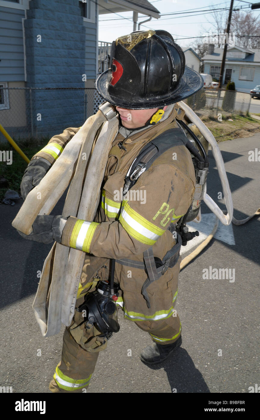 Firefighter fireman water hose hi-res stock photography and images - Alamy