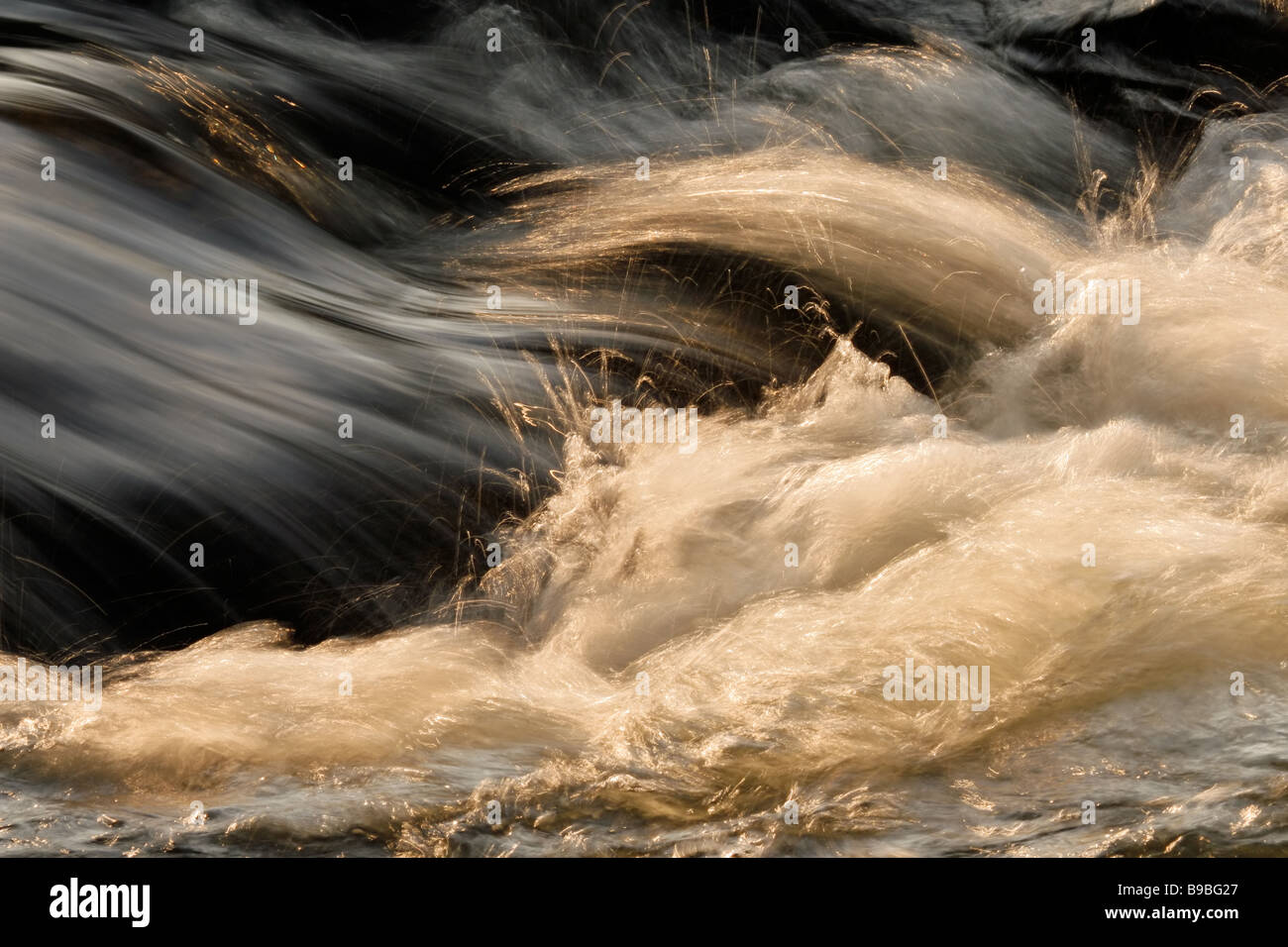 Flowing water taken with a slow shutter speed Stock Photo - Alamy