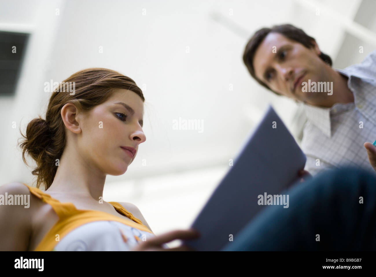 Mature woman examines documents hi-res stock photography and images - Alamy