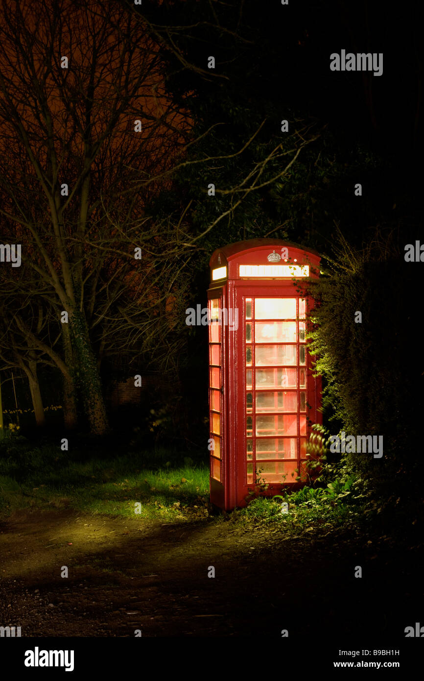 Red telephone box in rural hi-res stock photography and images - Alamy