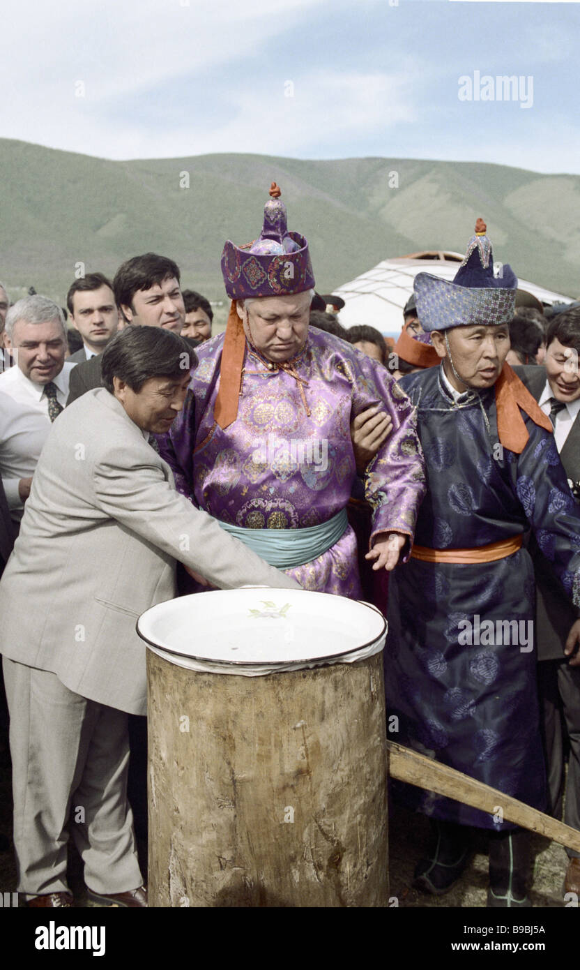 Russian President Boris Yeltsin center wearing the national Tuvinian ...