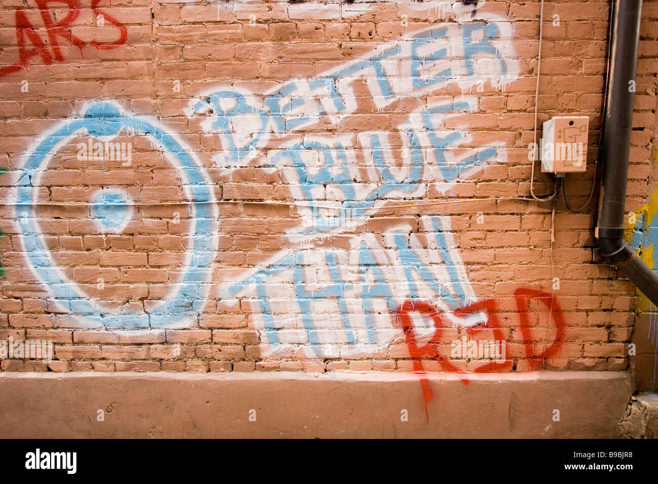 "Better blue than red" graffiti in downtown Toronto Stock Photo - Alamy