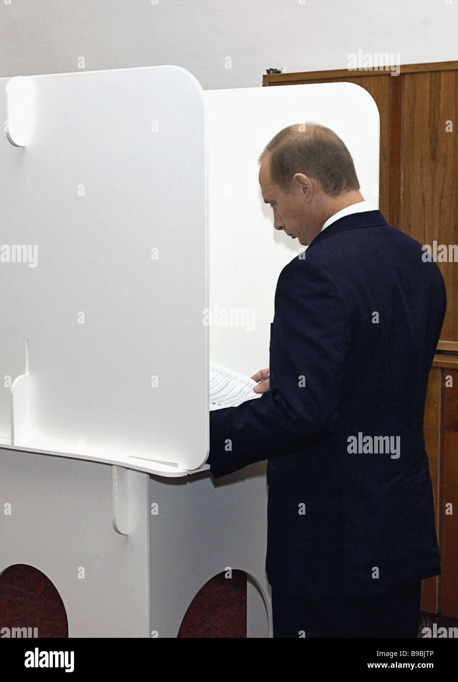 Russian President Vladimir Putin at polling station No 2039 at the ...