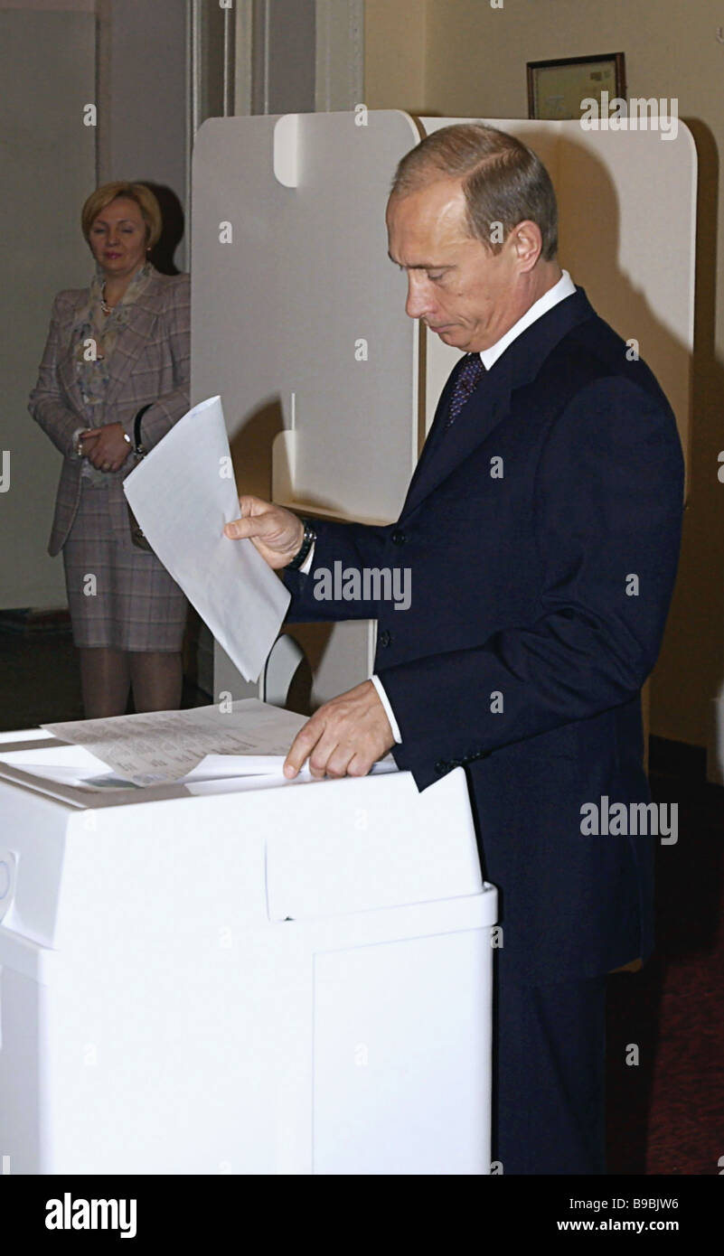 Russian President Vladimir Putin at polling station No 2039 at the ...