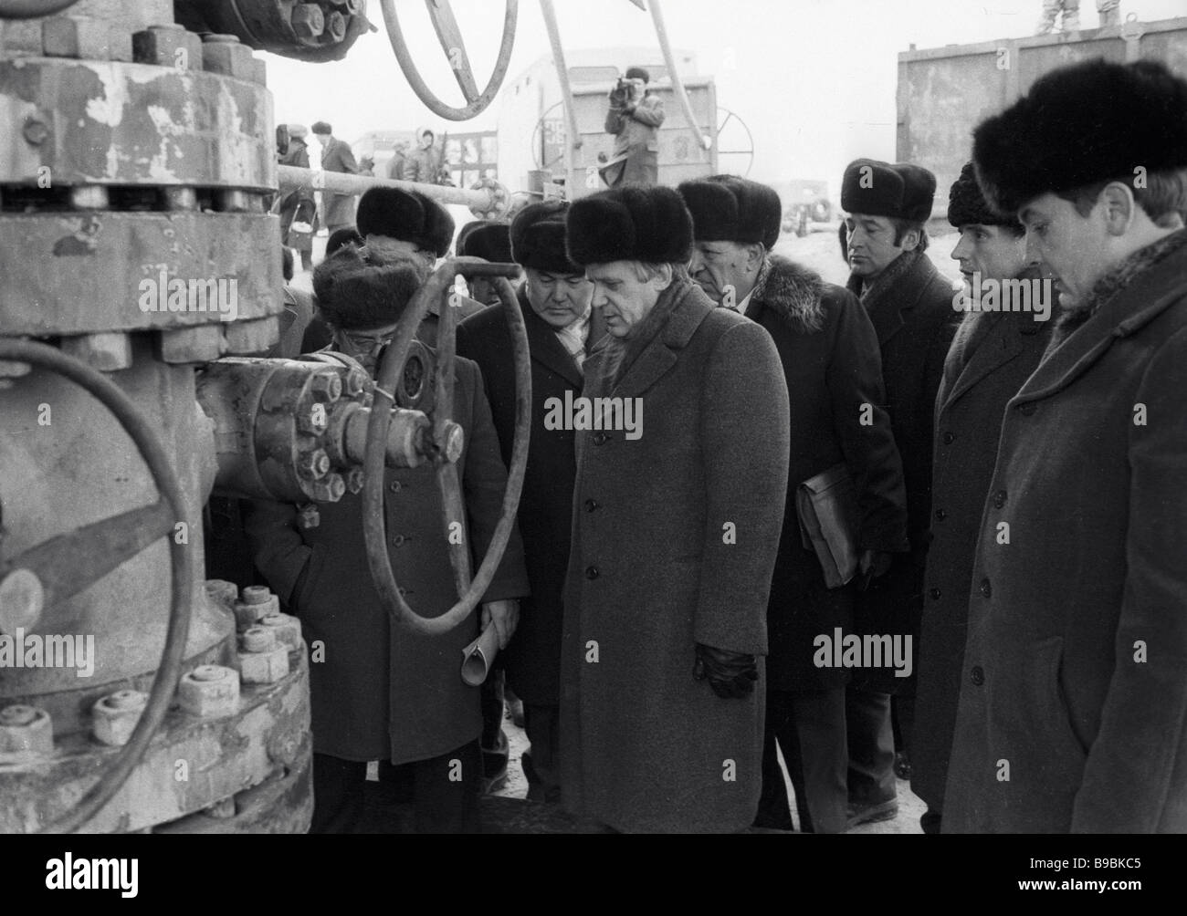 U S S R Council of Ministers Chairman Nikolai Ryzhkov center studying ...