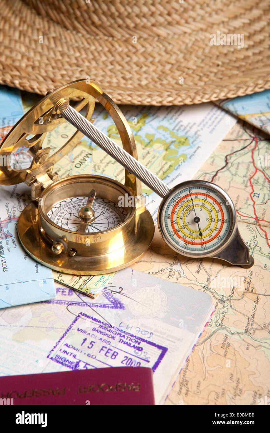 Compass distance meter map and passport of a tourist Stock Photo - Alamy
