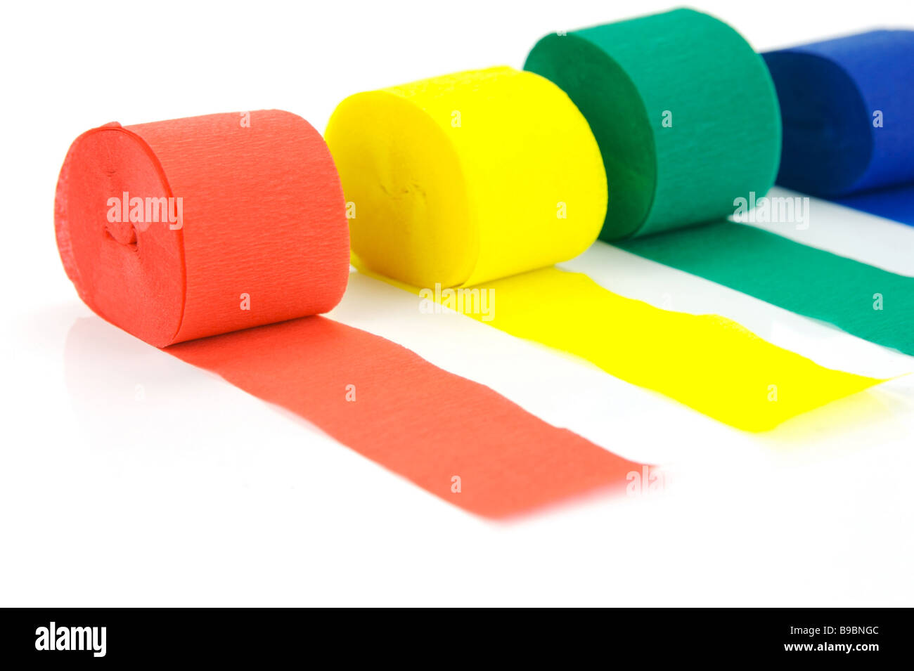 Colored streamers isolated against a white background Stock Photo - Alamy