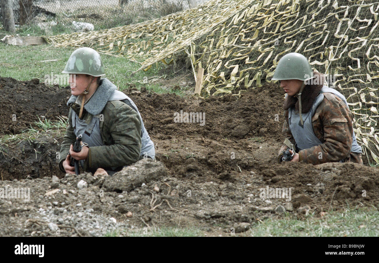 Interior troops keep watch at check point between North Ossetia and ...