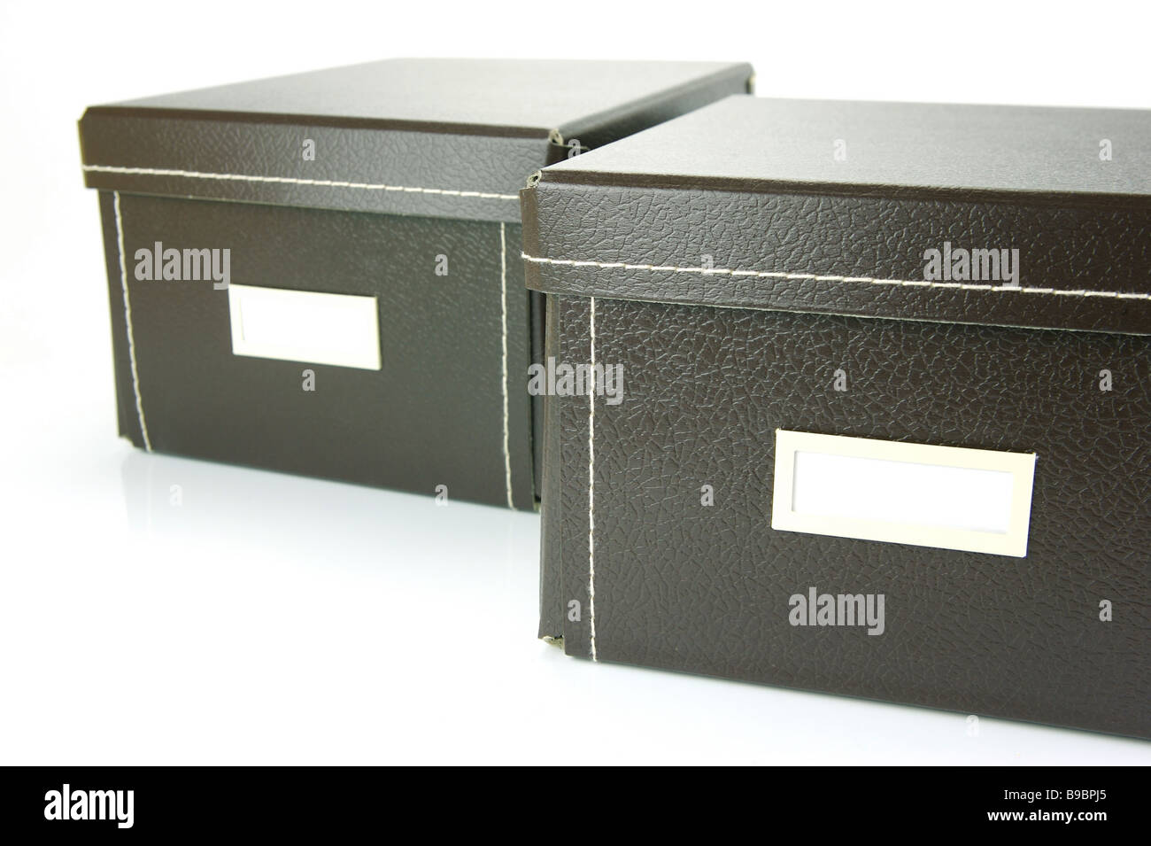Brown stationery boxes isolated against a white background Stock Photo ...