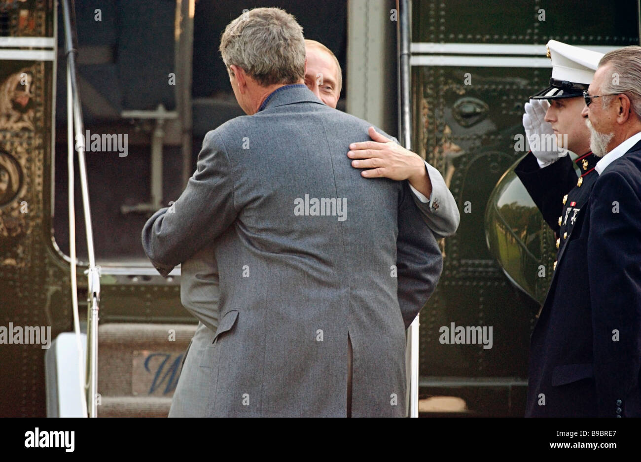 U S President George W Bush greeting Russian President Vladimir Putin ...
