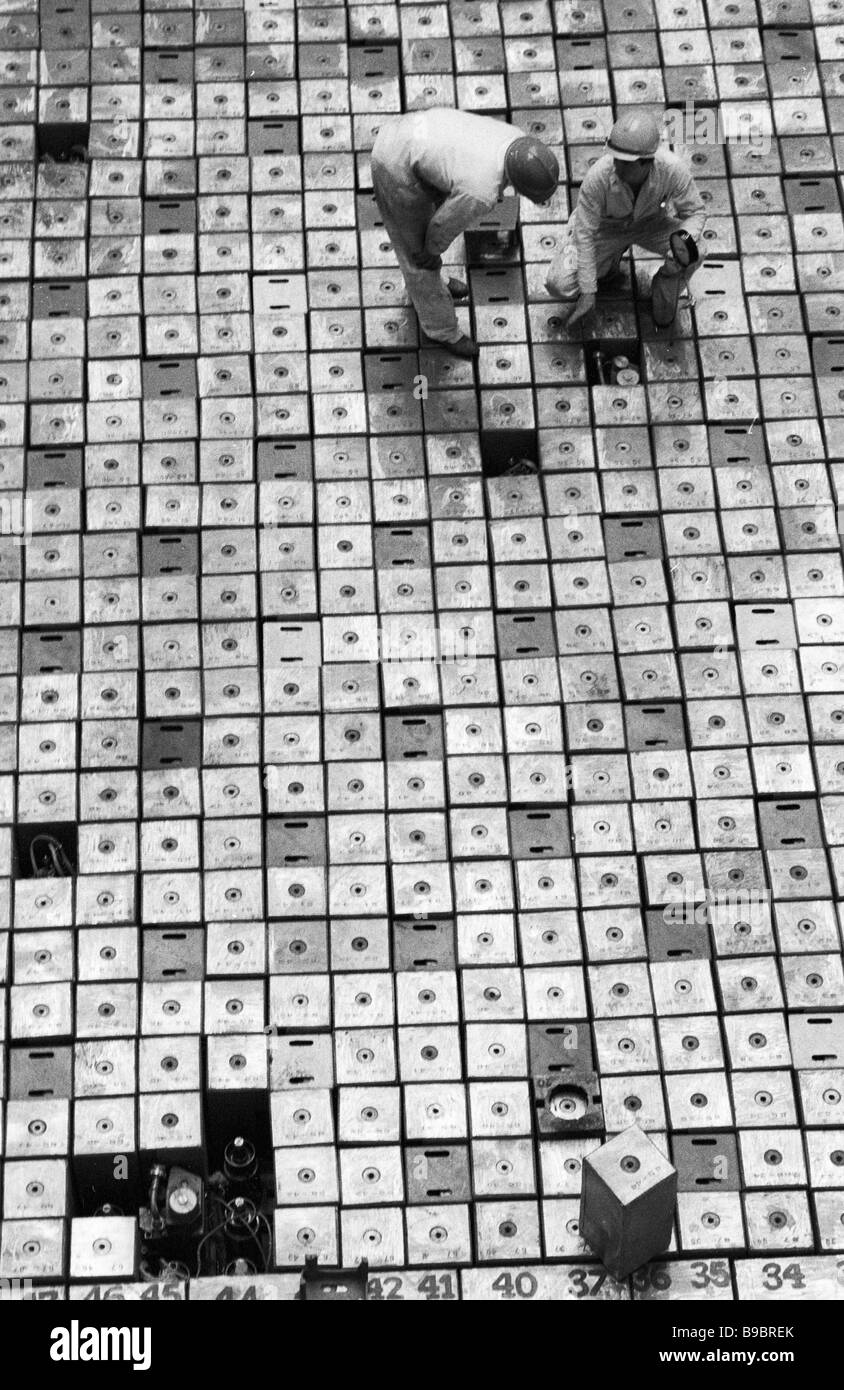 Workers of the Smolensk Nuclear Power Plant doing maintenance works in ...