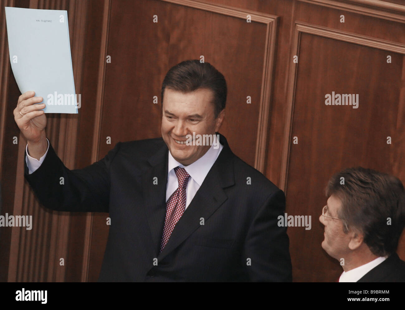 Viktor Yushchenko President of Ukraine right congratulates Viktor ...