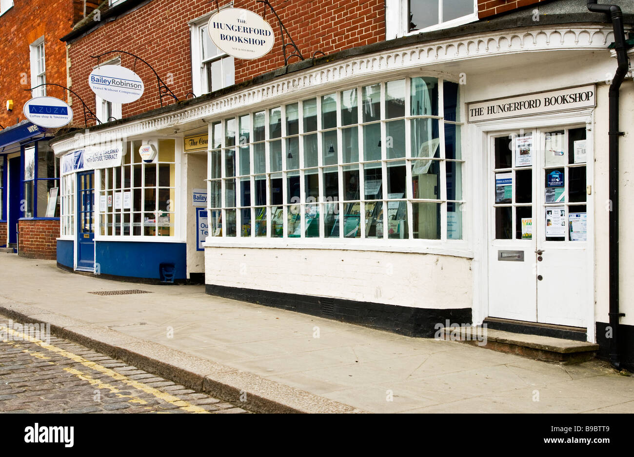 An independent bookshop and others along the High Street in Hungerford ...