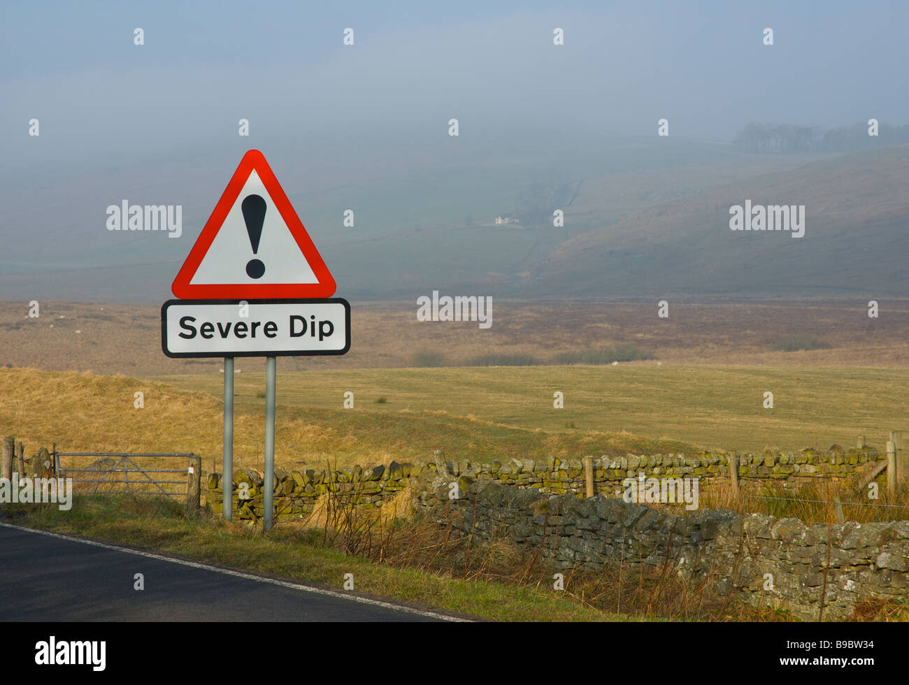 sign - Severe Dip - next to road, UK Stock Photo - Alamy