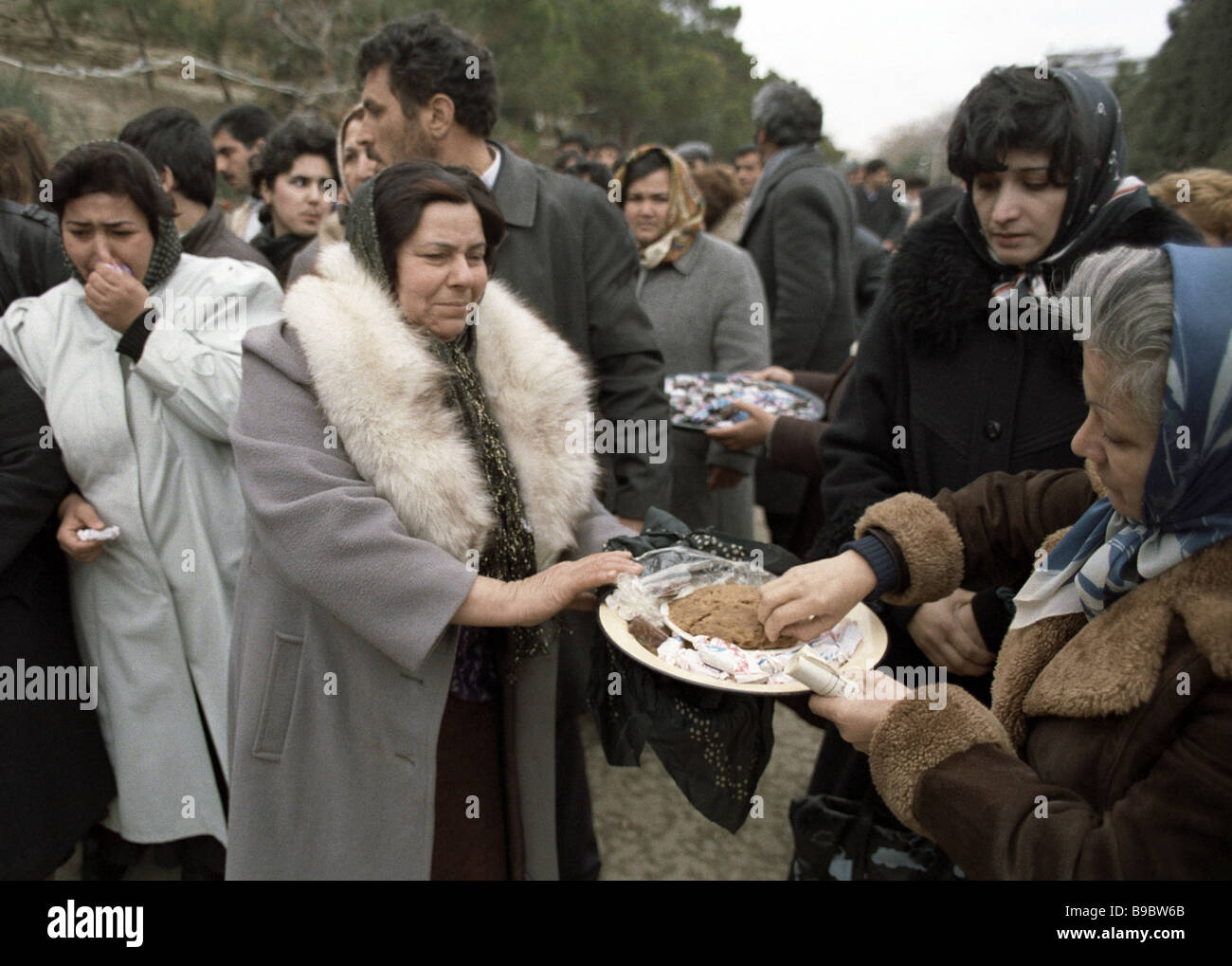 Baku residents gather in the city s central park to remember those who ...