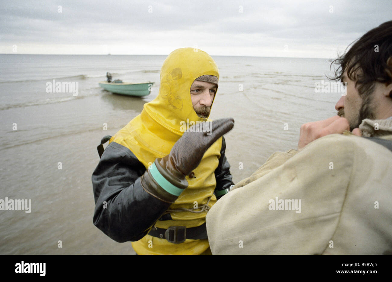 Diver reporting the state of the seabed after studying it due to the ...