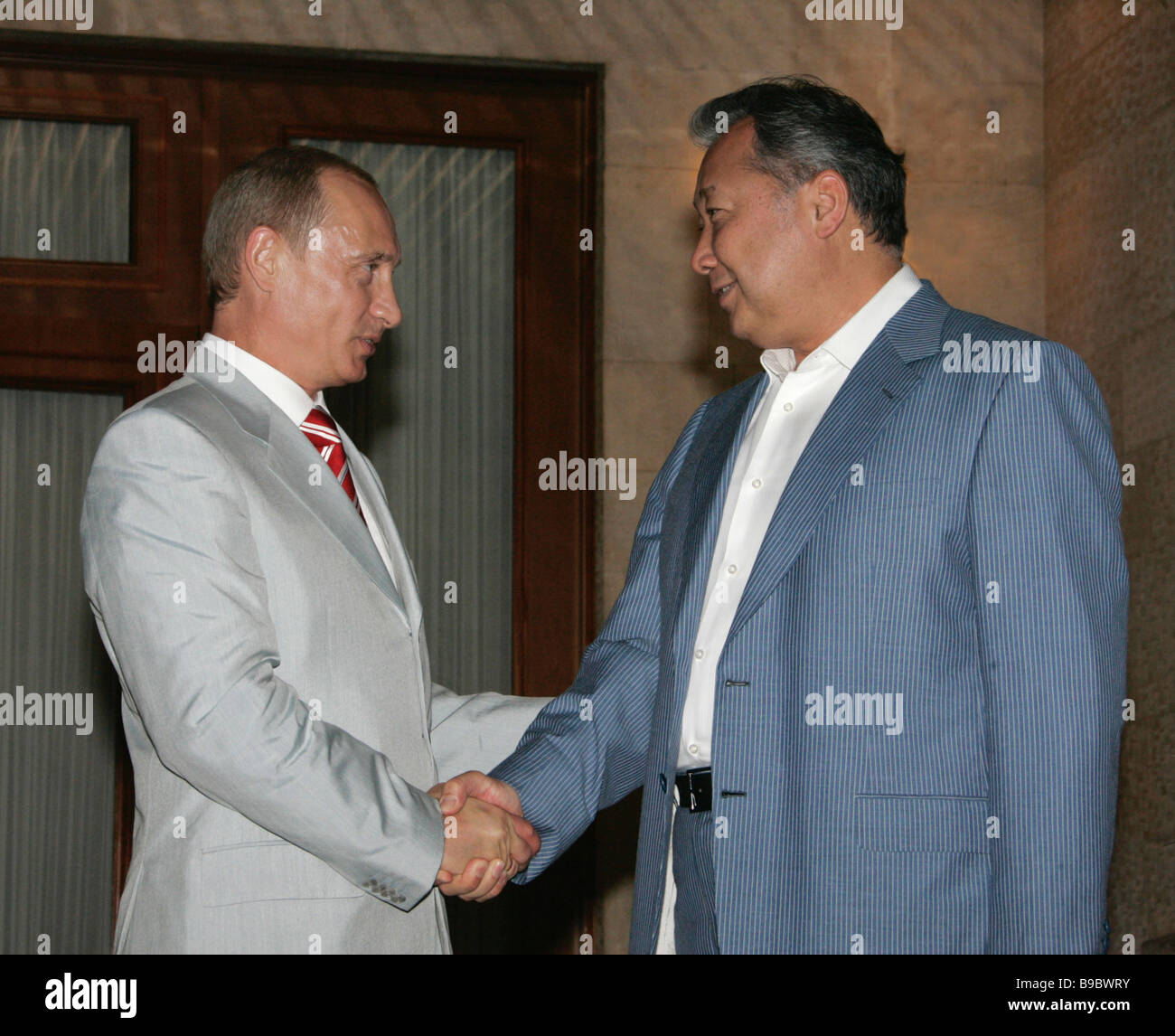 Presidents Vladimir Putin of Russia left and Kurmanbek Bakiyev of ...