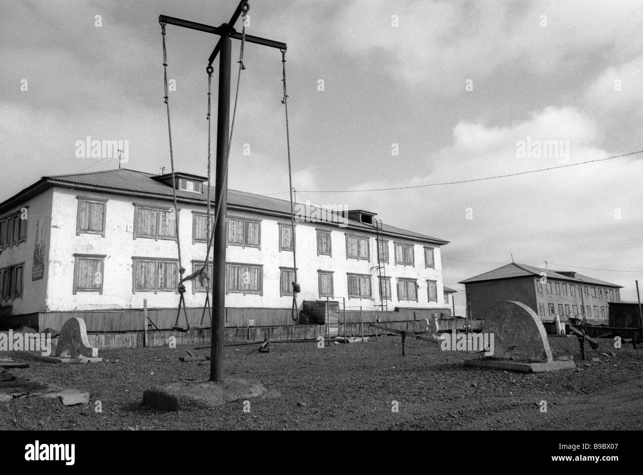 Deserted house with boarded up windows on Dikson Island Stock Photo - Alamy