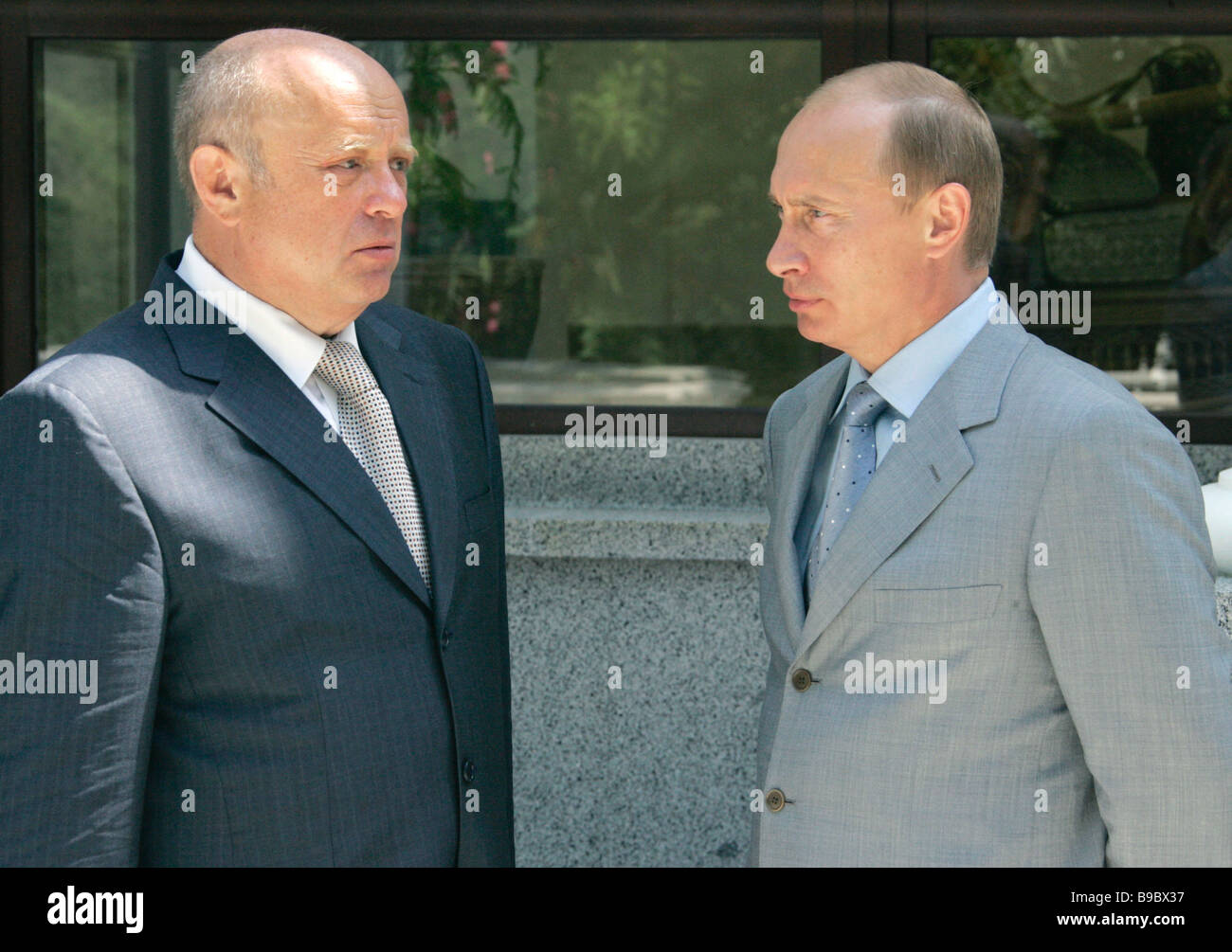Russian President Vladimir Putin right and Prime Minister Mikhail ...