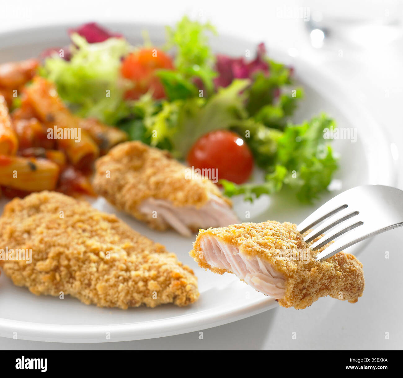 breaded chicken fillets Stock Photo - Alamy