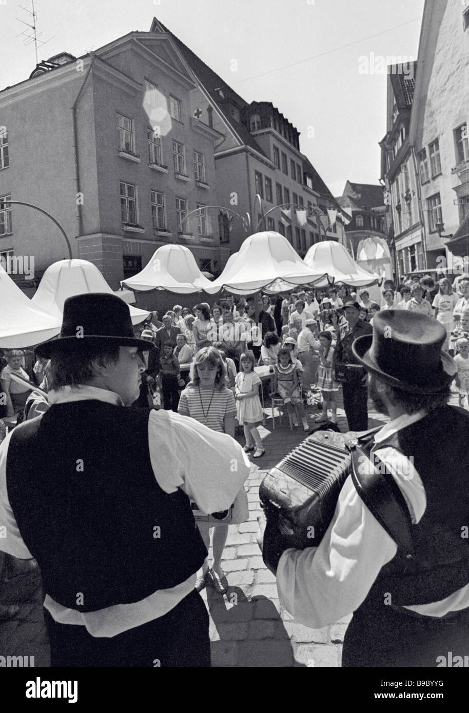 Townspeople celebrating Days of the Old Town Stock Photo - Alamy