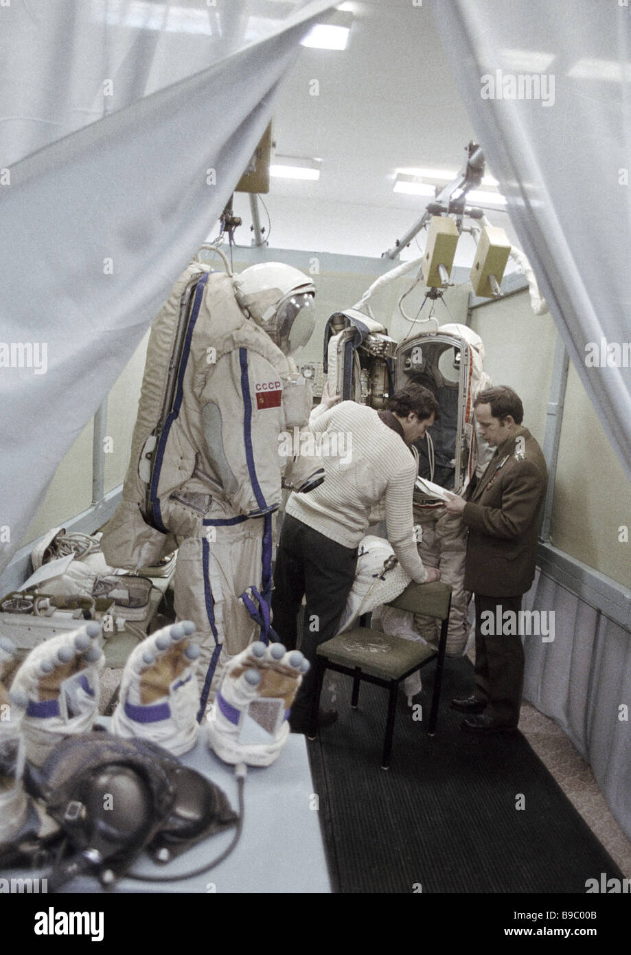 Soyuz TM 9 spacecraft commander Anatoly Solovyev right and board ...