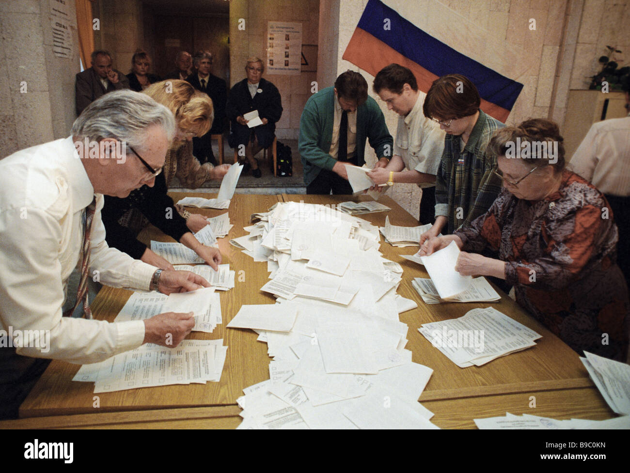 Election commission members counting votes with observers monitoring ...
