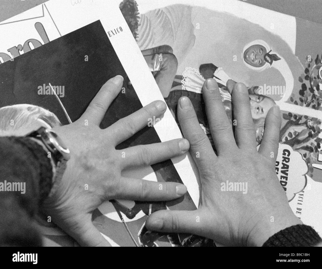 Psychic healer Alan Chumak s hands as he is charging an issue of the ...