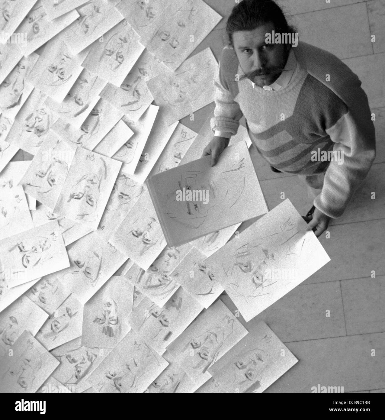 Sergei Arto with his 565 graphic portraits created in 24 hours and 2 ...