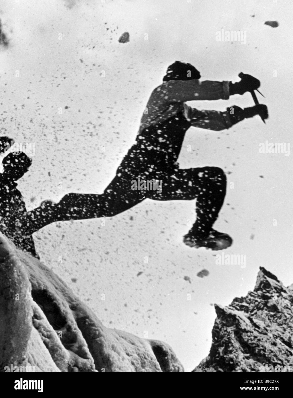 A daring leap on a Caucasian glacier Stock Photo - Alamy