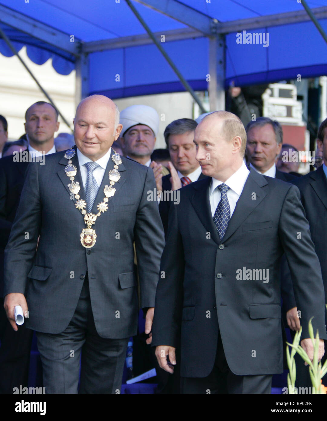 Moscow Mayor Yuri Luzhkov and Russian President Vladimir Putin left to ...