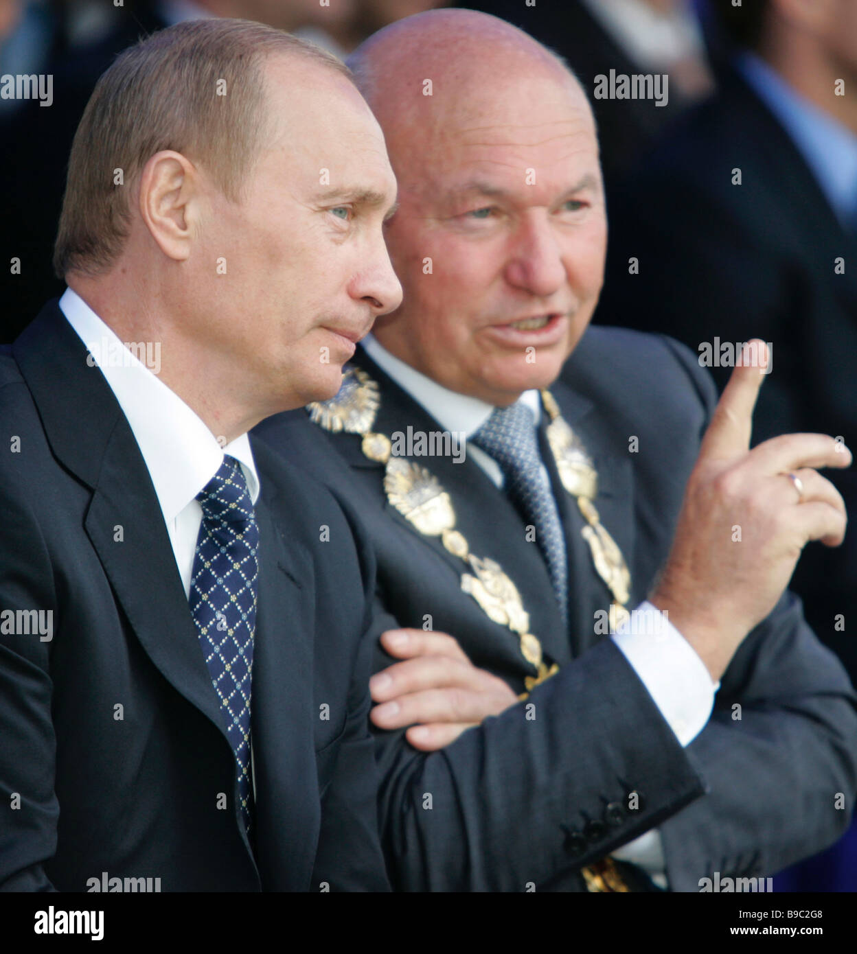 Russian President Vladimir Putin and Moscow Mayor Yuri Luzhkov left to ...