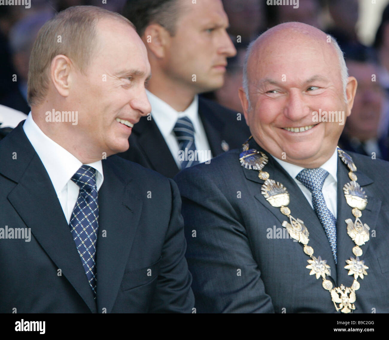 Russian President Vladimir Putin and Moscow Mayor Yuri Luzhkov left to ...