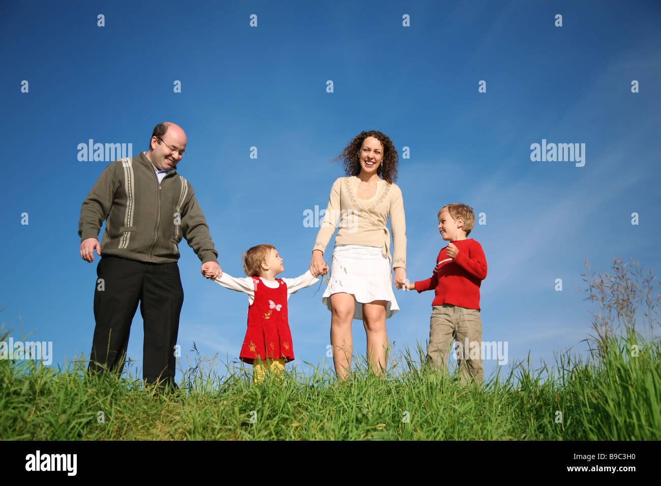 parents child standing Stock Photo - Alamy