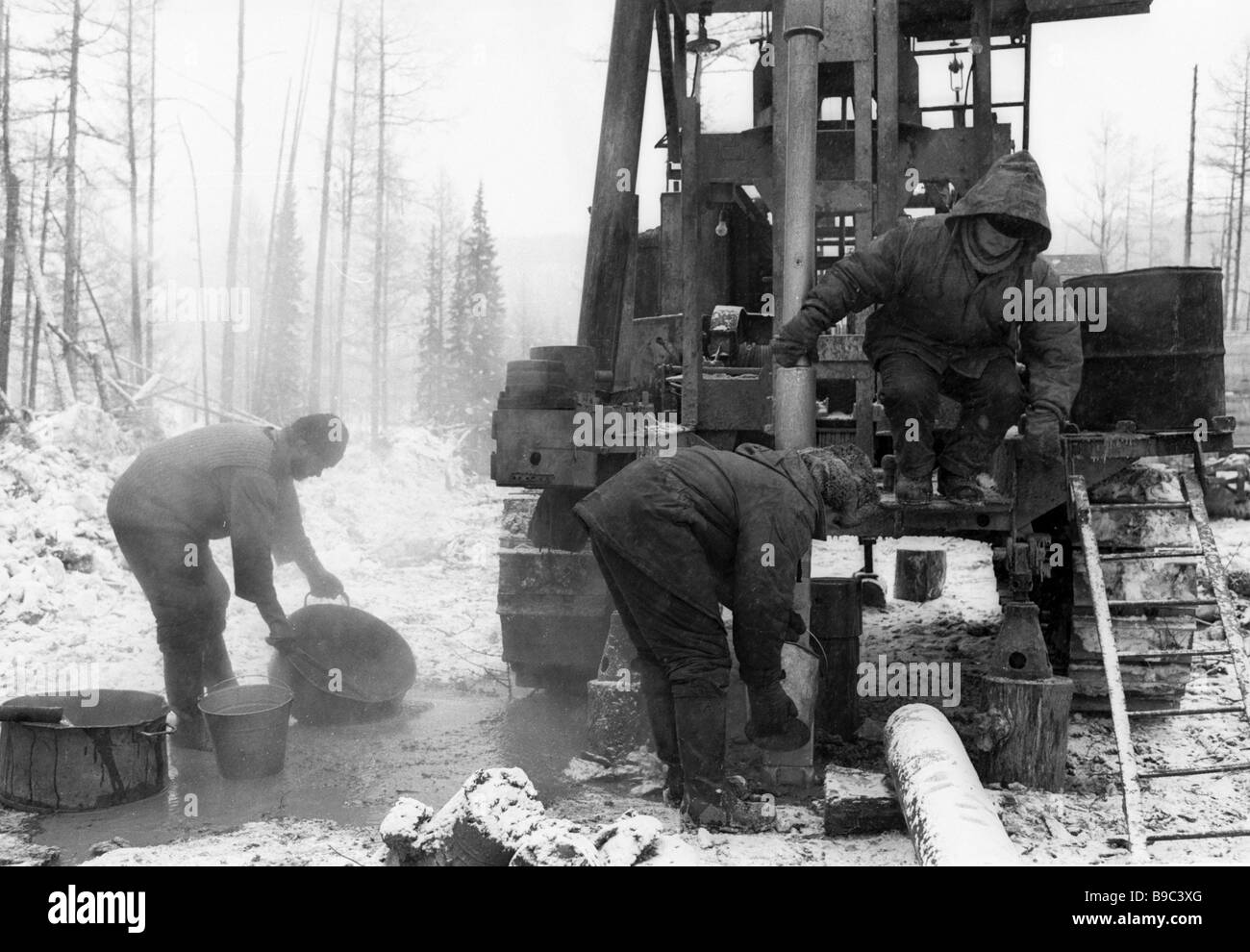Vostok gold digging company s geologists prospecting in the Odola River ...