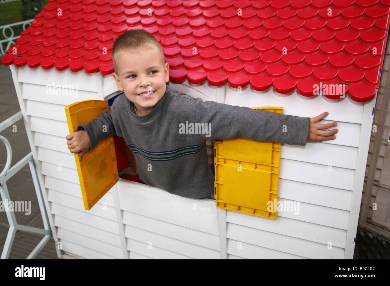 boy in the toy house Stock Photo - Alamy