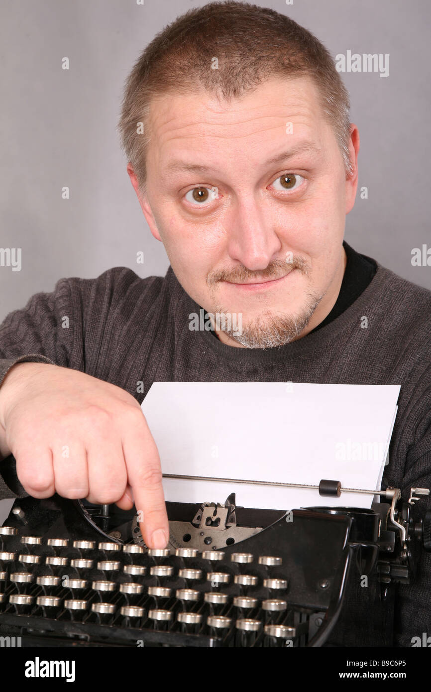 man and typewriter Stock Photo - Alamy